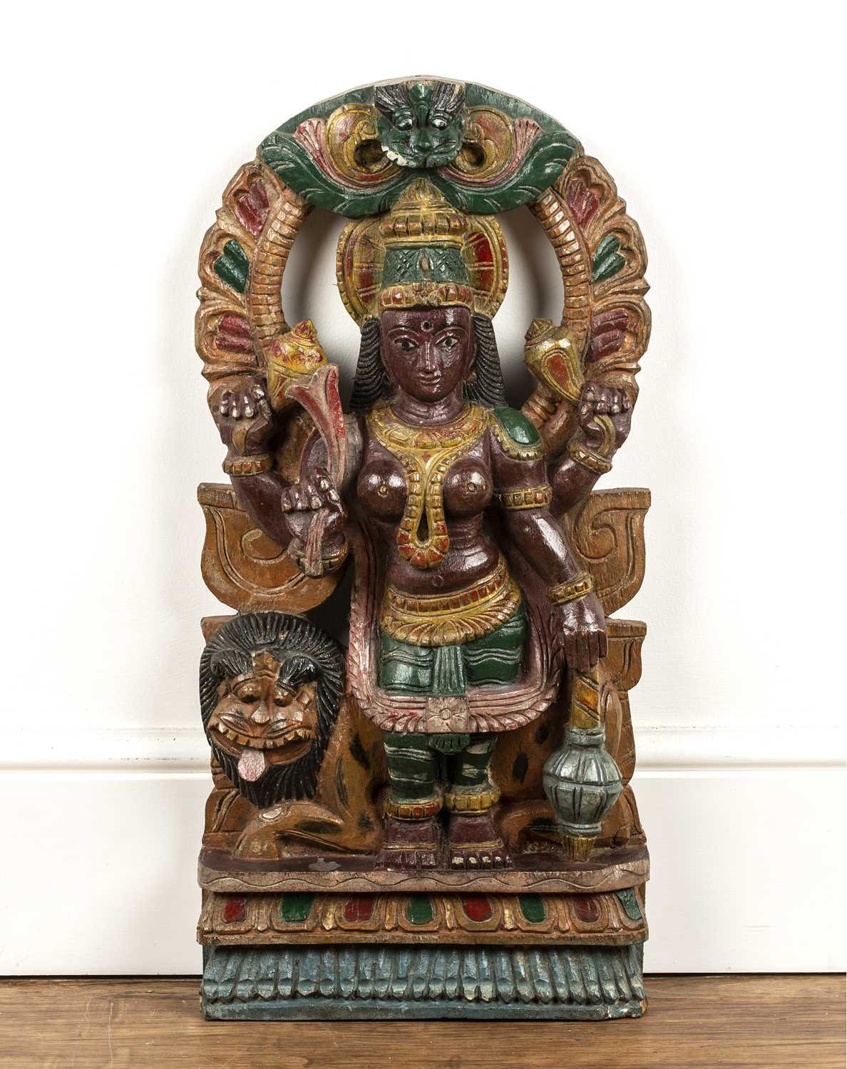 Lot 569 - Carved wood and coloured Durga Probably