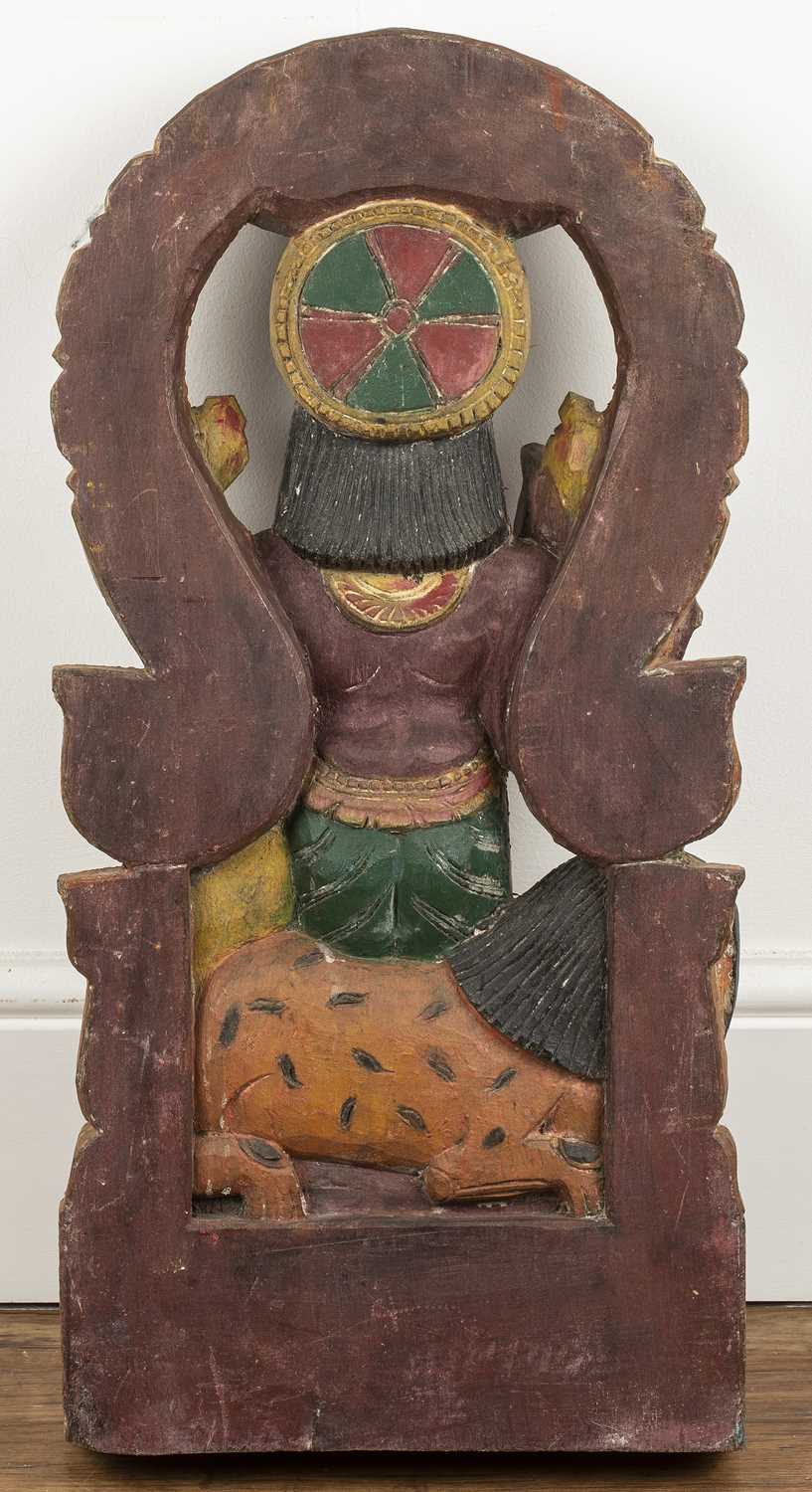 Lot 569 - Carved wood and coloured Durga Probably
