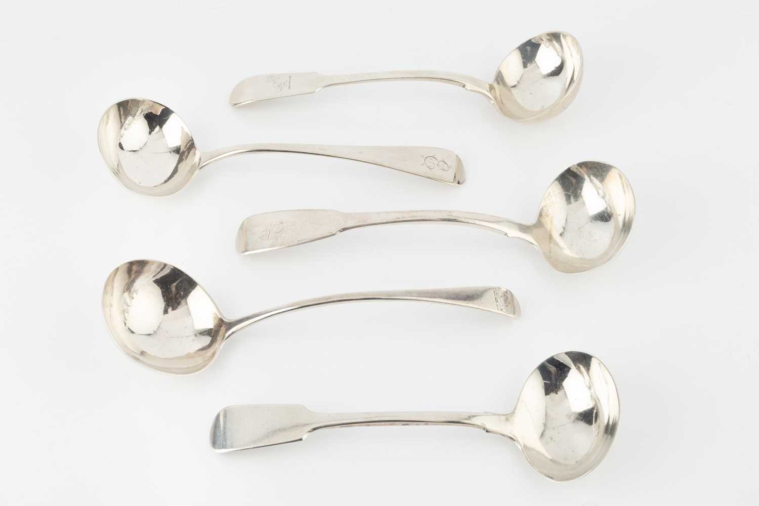 Lot 658 - A George III silver fiddle pattern sauce