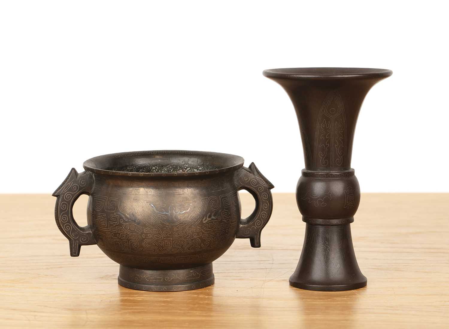 Lot 371 - Two silver-wire inlaid ritual vessels Shisou