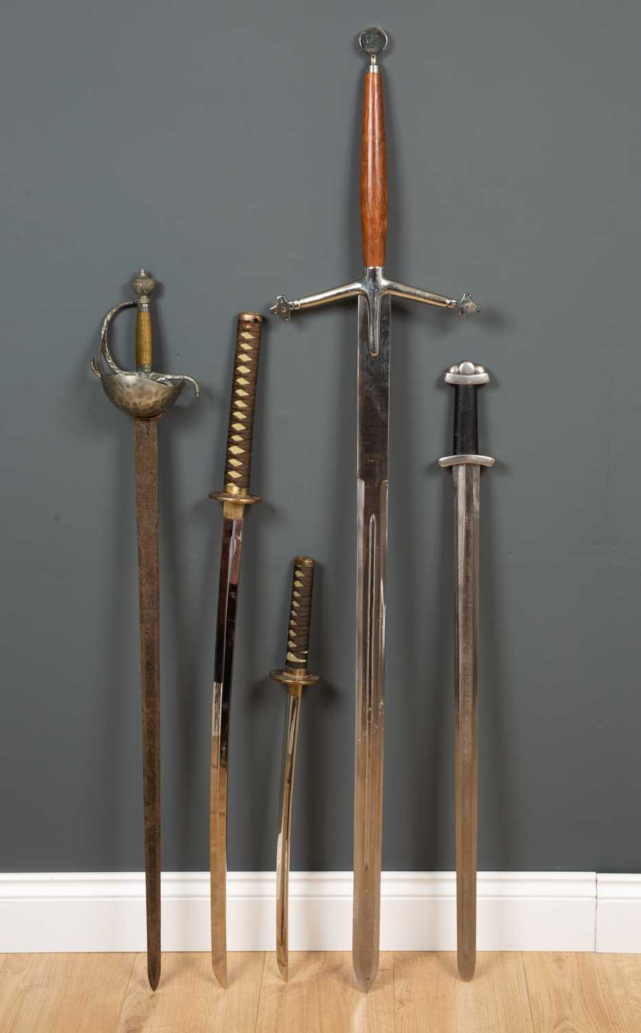 Lot 42 - A collection of five reproduction swords to